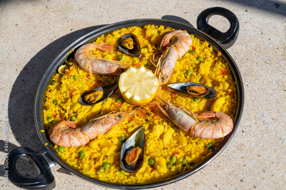 Foto de Stock Paella with prawn, mussels and rice. Traditional spanish ...