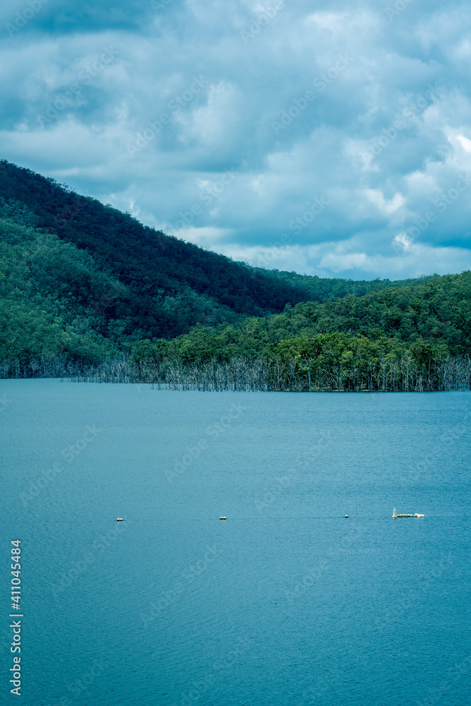 The Hinze Dam is a rock and earth-fill embankment dam with an un-gated ...