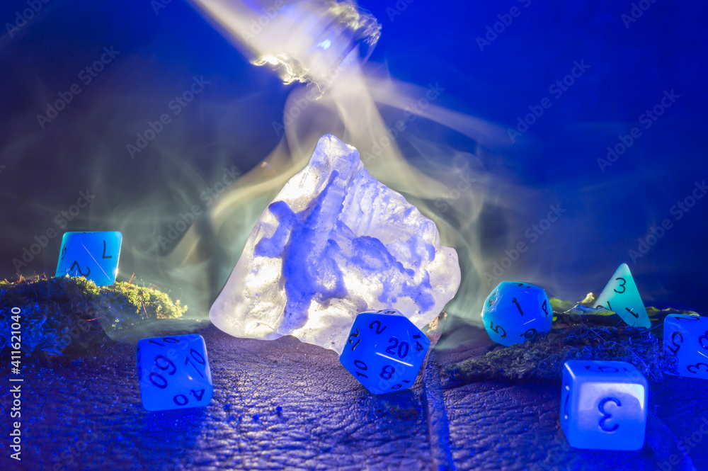 Backlit salf crystal and dice Stock Photo | Adobe Stock