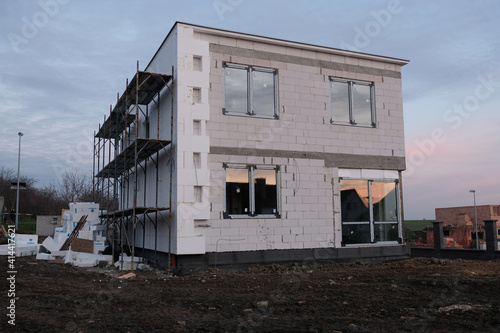 View of an unfinished two-storey house, typical modern suburban house ...
