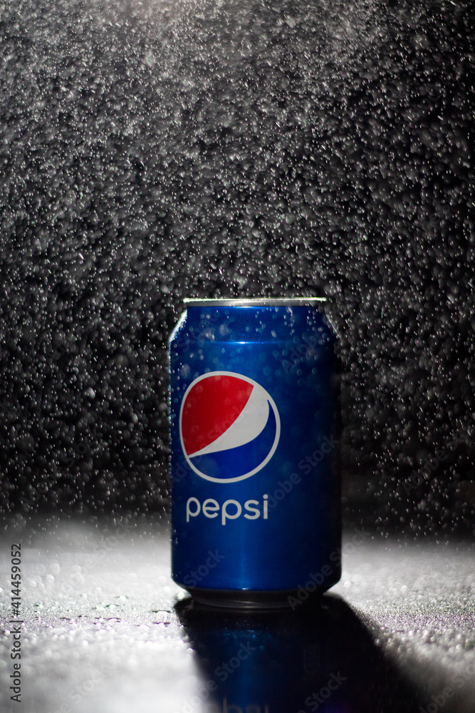 Pepsi soda can with water drops splashes on black background editorial ...