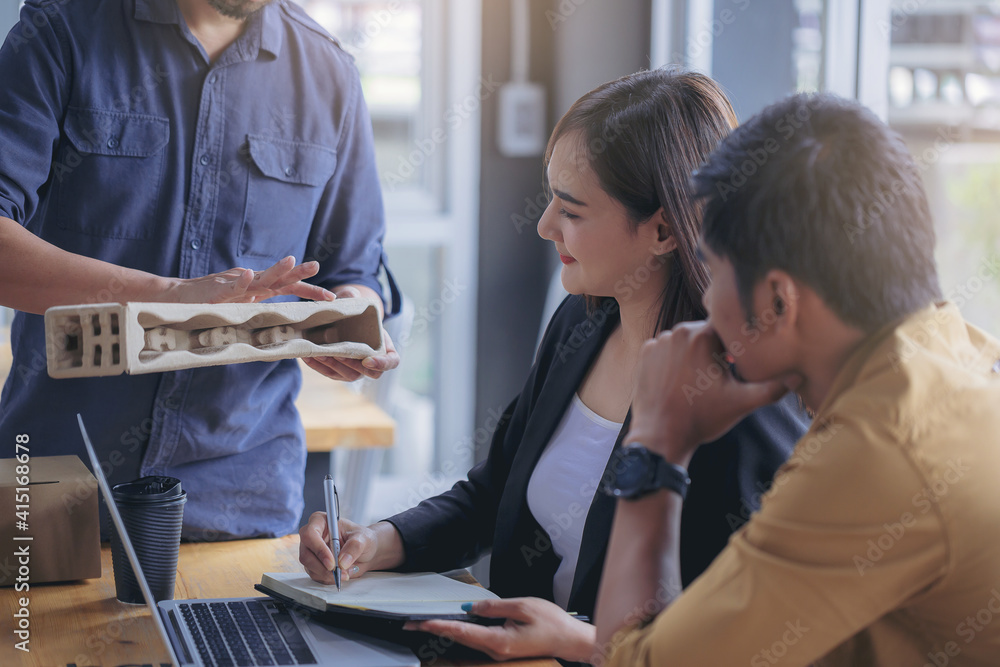 Team designer working graphic packaging design with color chart and ...