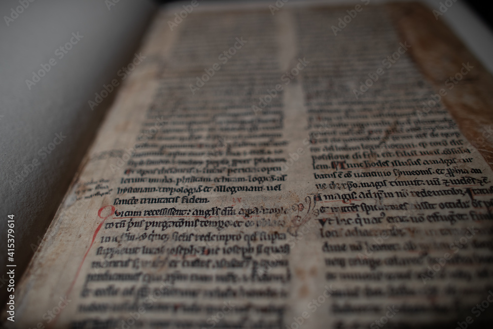 Medieval manuscript hand written on vellum with rubricated and ...