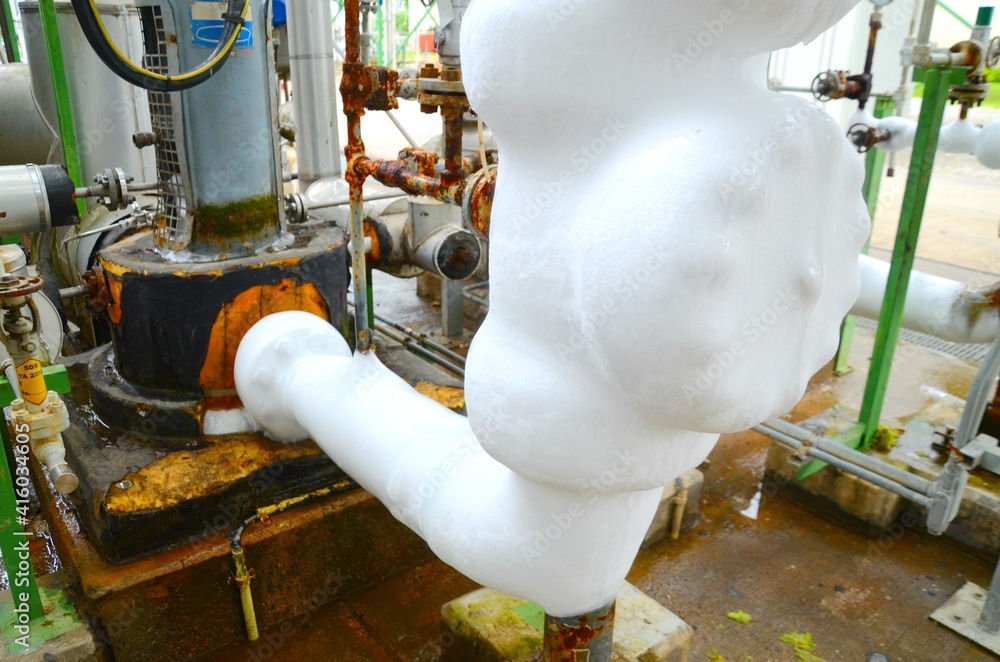 Stock-Foto „Production valve with ice on piping or pipeline due to high ...