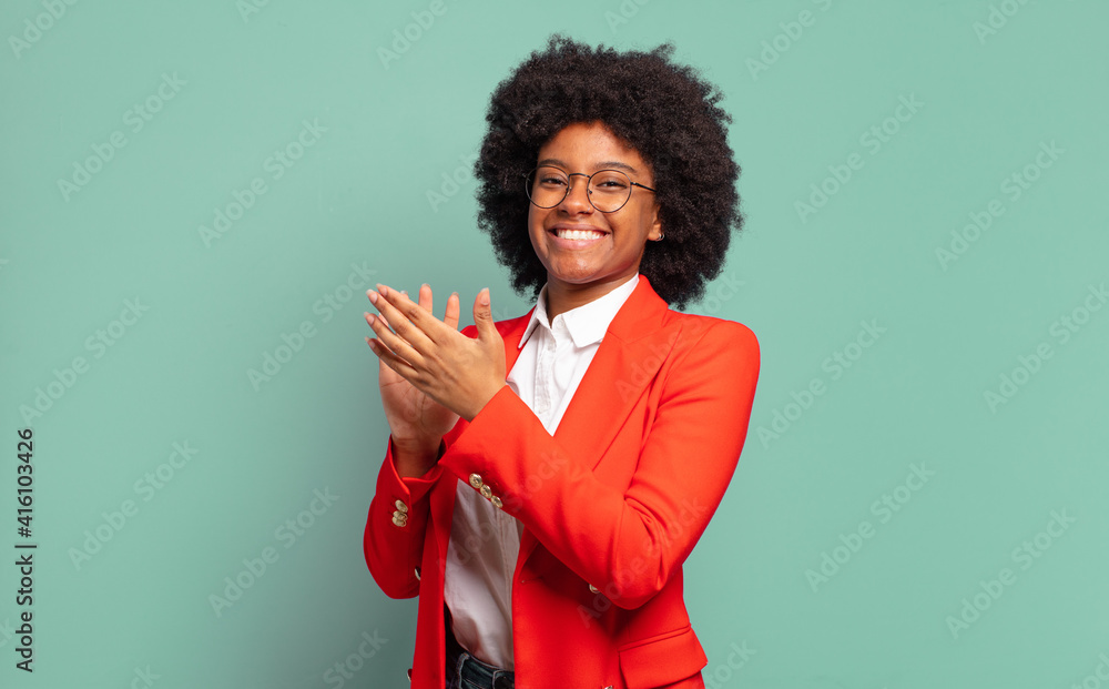 feeling happy and successful, smiling and clapping hands, saying ...