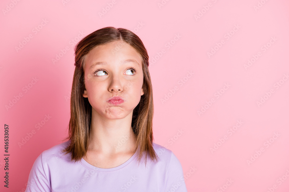Photo of dreamy young teenage girl look empty space hold air cheeks ...