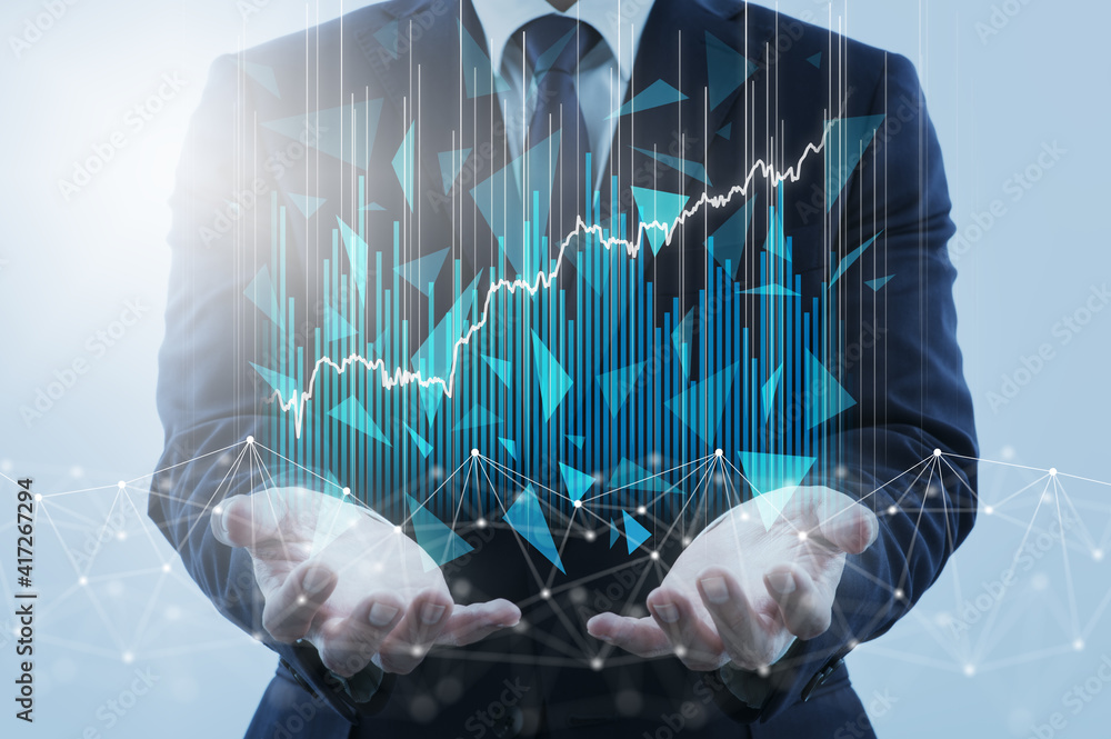 Business innovation and economic boom. Business person holding network ...