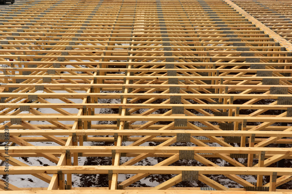 Wood framing members providing support for second story of apartment ...