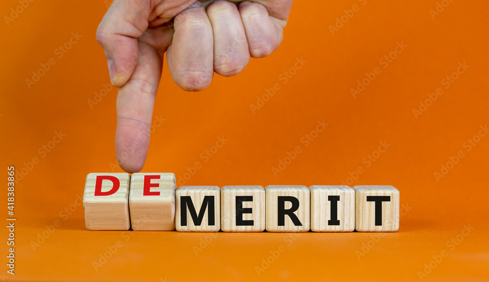 Demerit or merit symbol. Businessman turns wooden cubes and changes ...