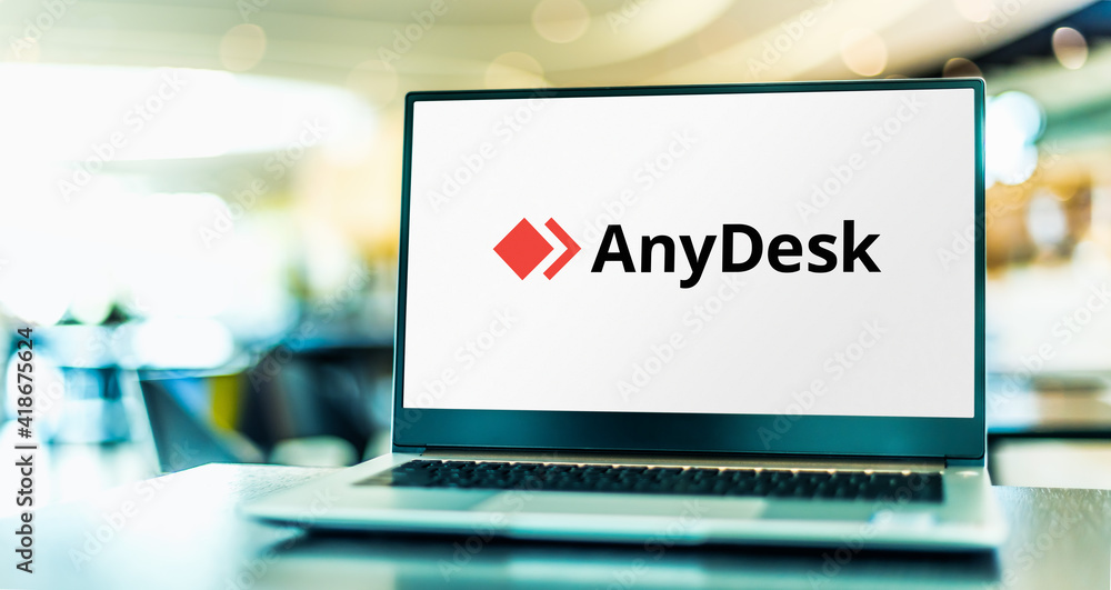 Laptop computer displaying logo of AnyDesk Stock Photo | Adobe Stock