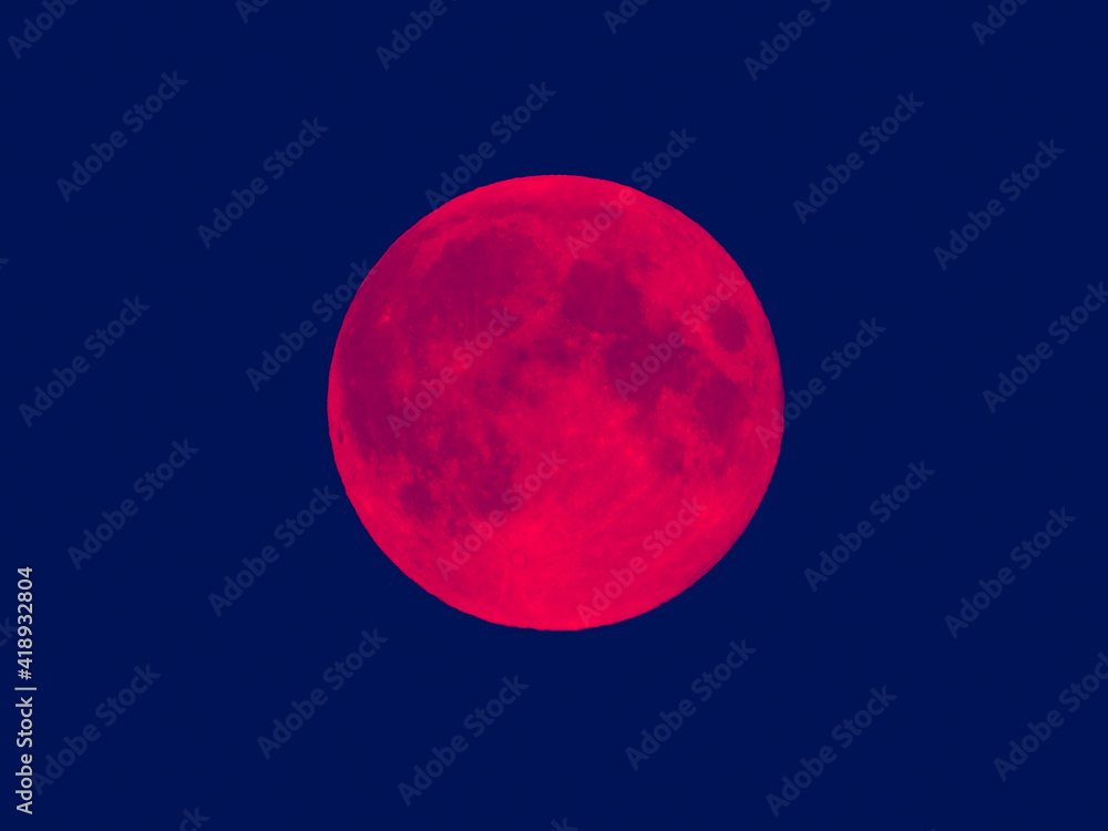 Earth's Moon Glowing with different colours in the Background. Blue and ...