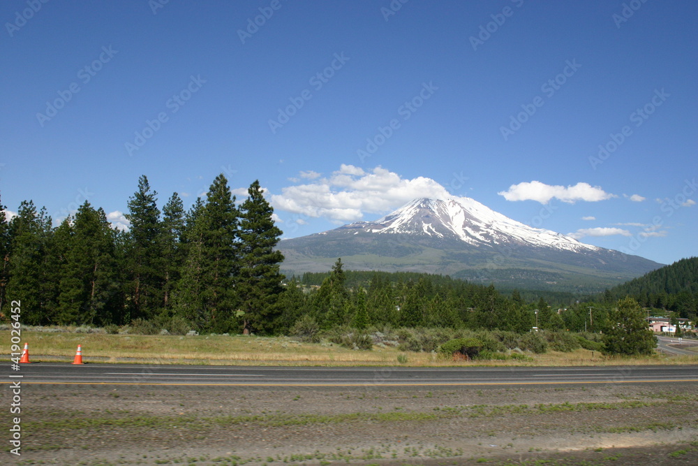 Mt Shasta from the 15 Freeway Northern California with a Conifer Wood ...