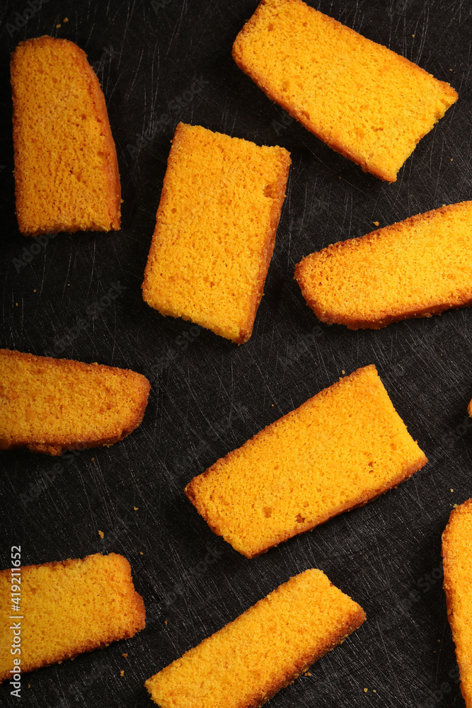 cake rusk cookies on black background Stock Photo | Adobe Stock