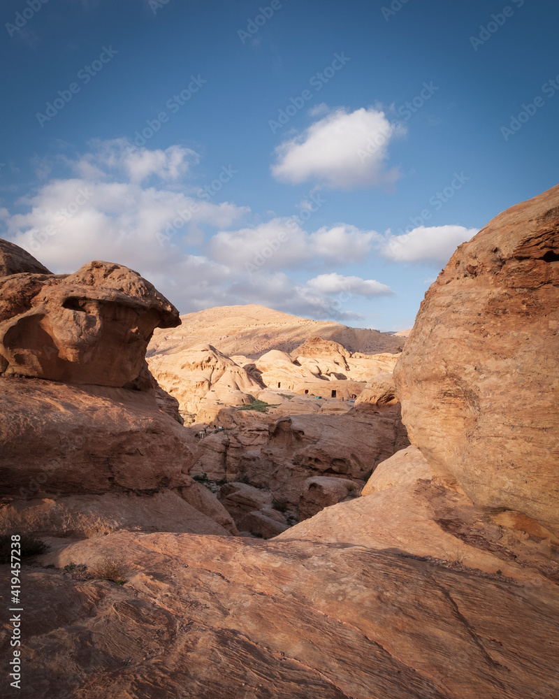 bizarre cliffs of light limestone in the desert mountains near the city ...