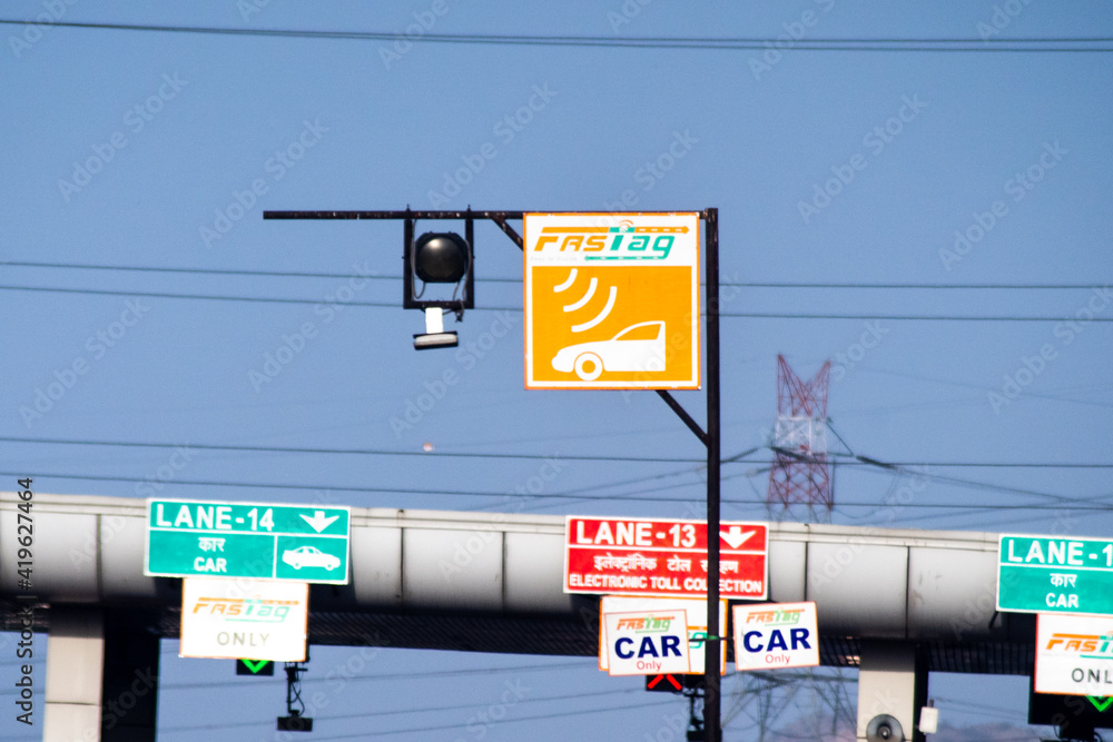 Fast Tag sign near a toll booth showing the new cashless RFID based ...