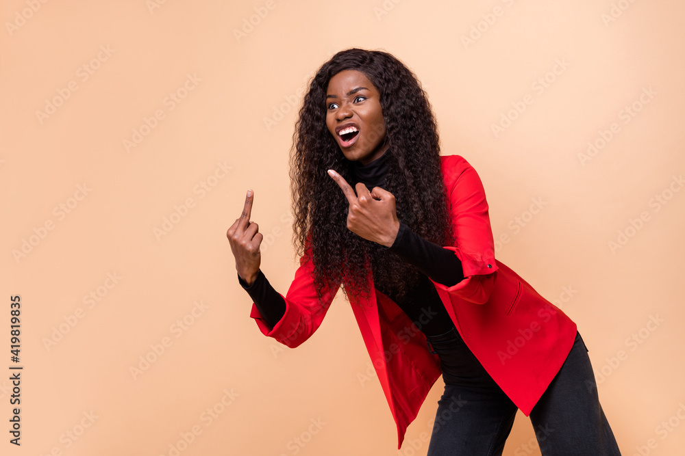 Photo of angry afro american young woman show middle finger scream ...