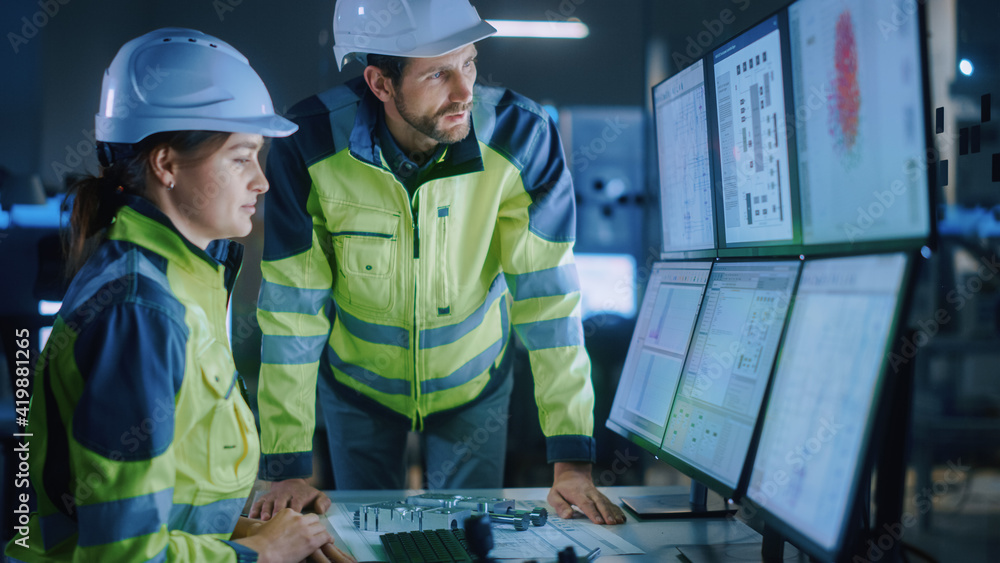 Industry 4.0 Modern Factory: Project Engineer Talks to Female Operator ...