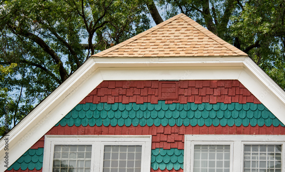 Historic polychrome decorative shingle pattern on a New England house ...