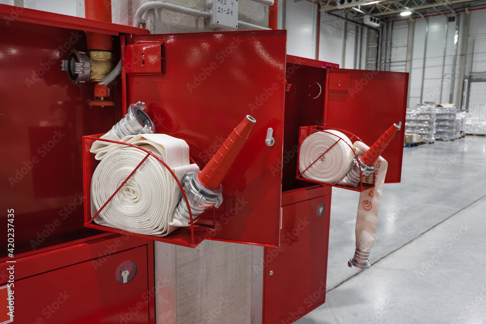 fire safety in the warehouse. new fire hydrants. red box. fire ...