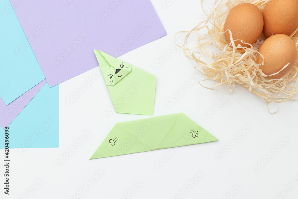 DIY Children's Easter craft bunny with an egg. Step 20. Easter paper ...
