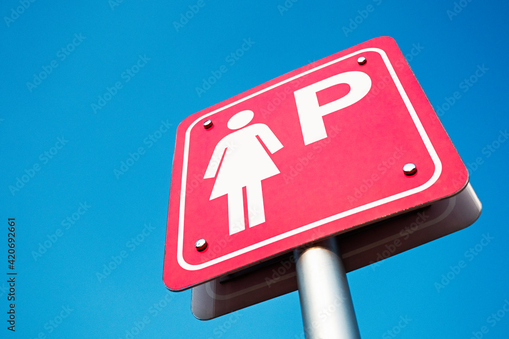 Pink female parking sign Stock Photo | Adobe Stock