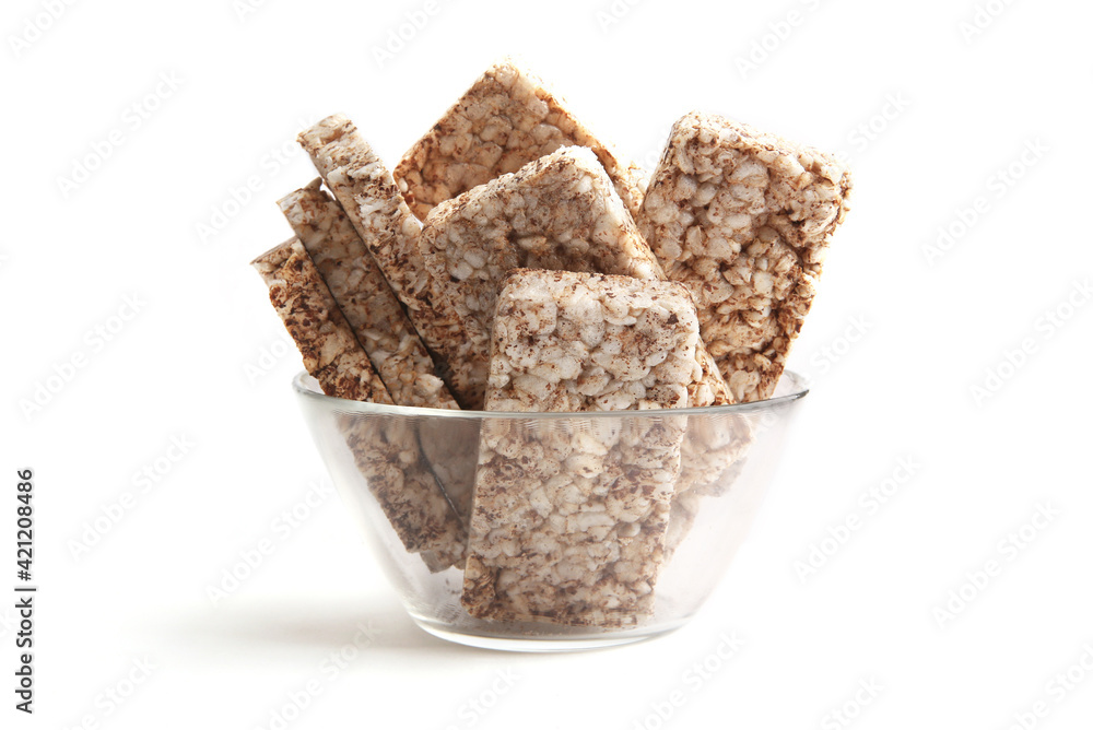 Puffed buckwheat cakes in glass bowl isolated on white background ...
