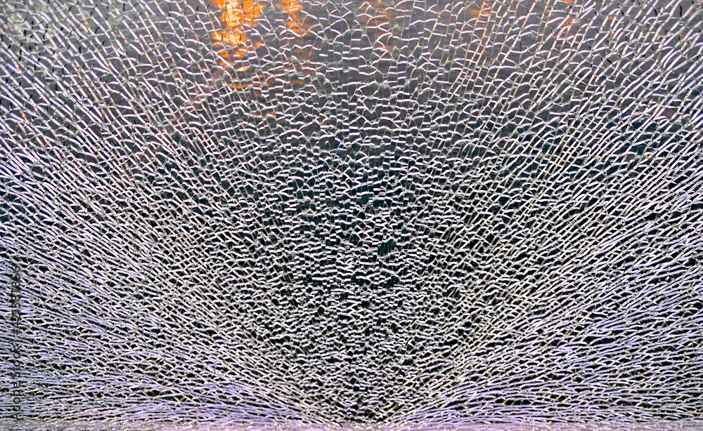 Shatterproof laminated safety glass, shattered; accidental radial ...