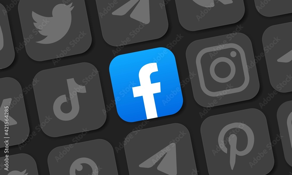 Facebook on the social media app background. Social media icons ...