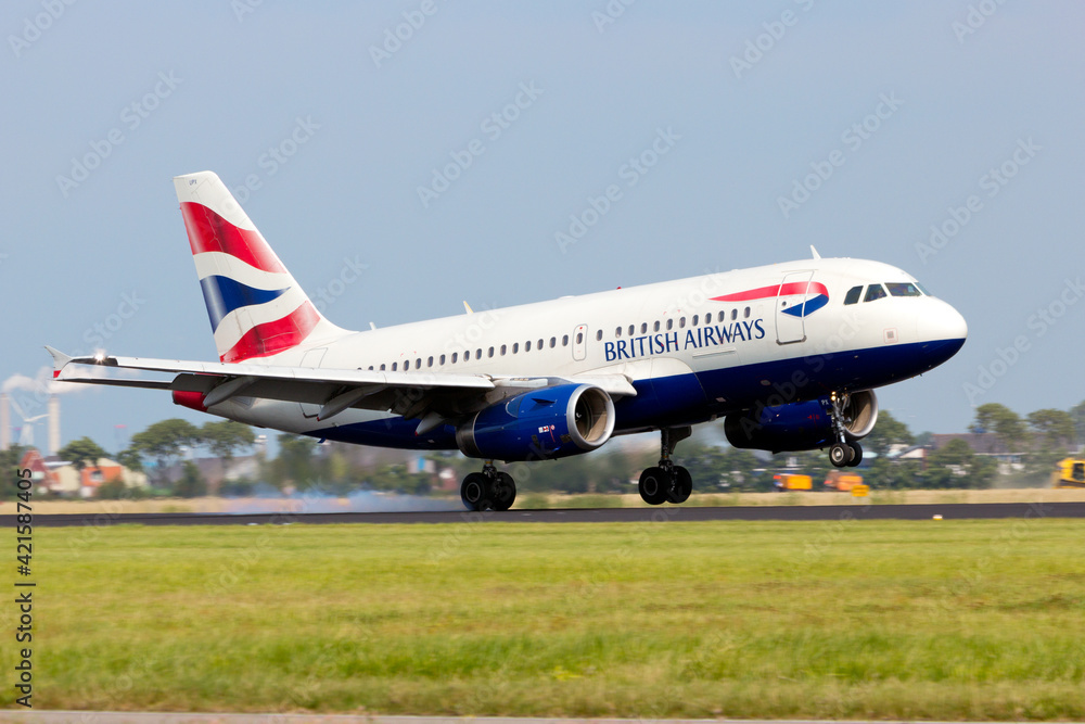 British Airways Airbus A318 passenger plane taking off from Amsterdam ...