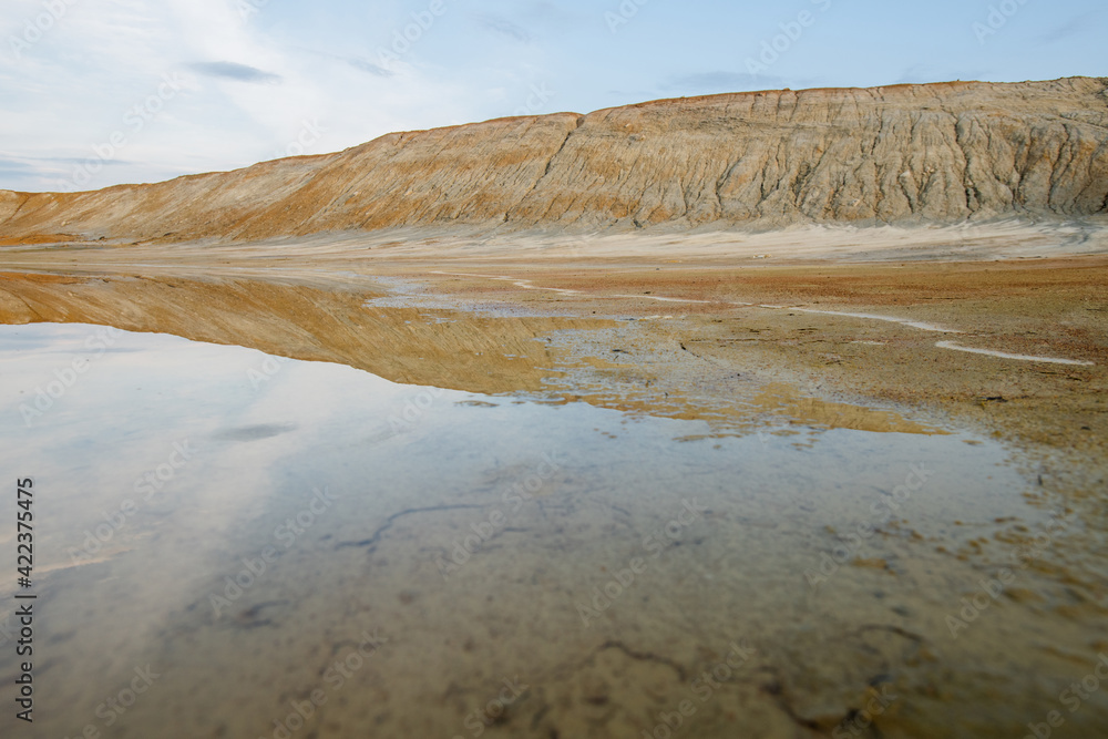 Dirty soil and water on vast polluted territory with bad environmental ...