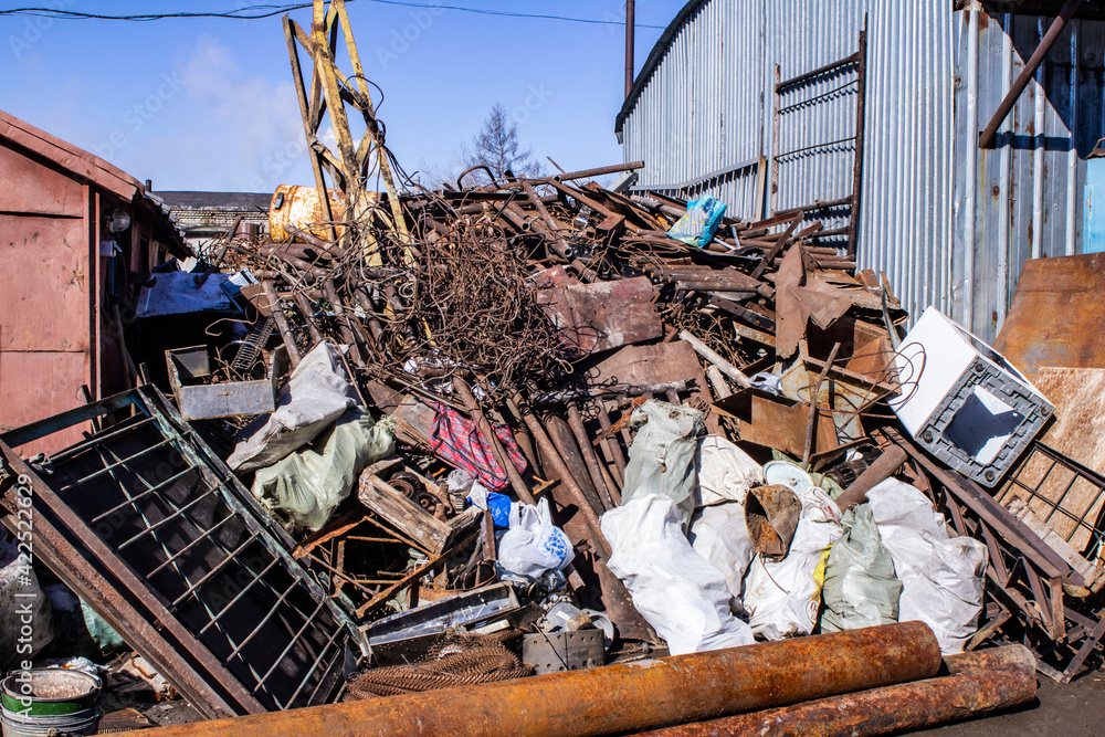 scrap metal collection point with floor scales in early spring during ...