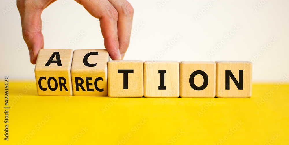 Photo Stock Action or correction symbol. Businessman turns wooden cubes ...