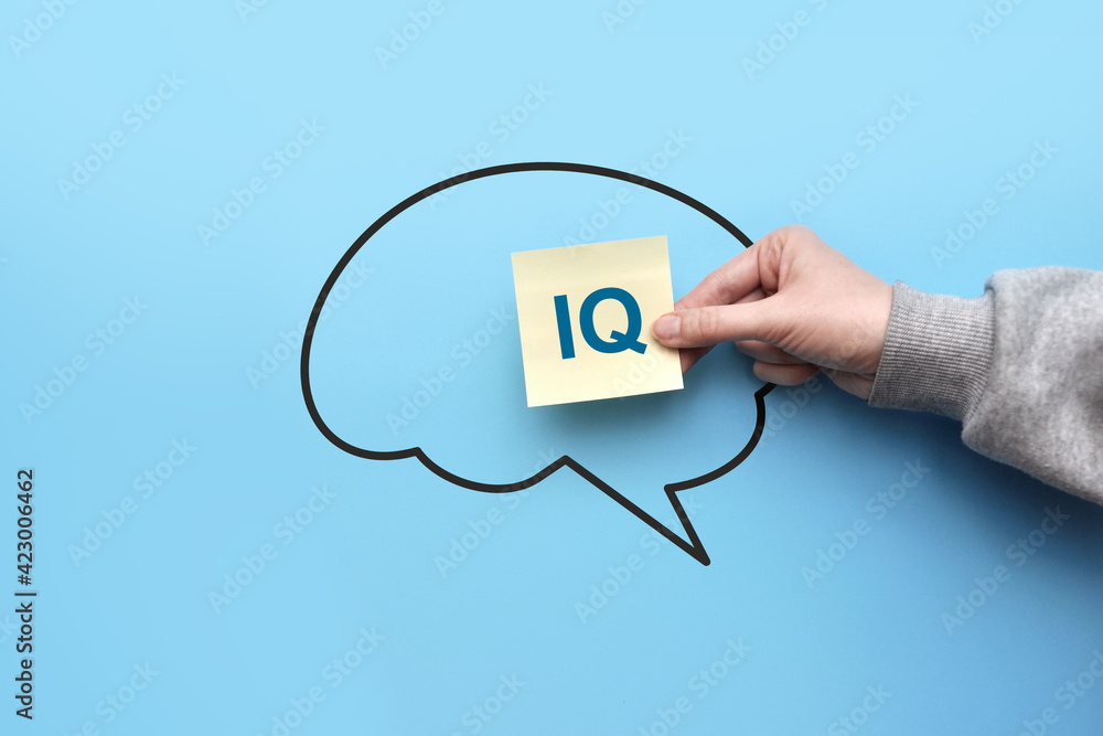 Стоковое фото «The silhouette of the brain and the words iq in it. A ...