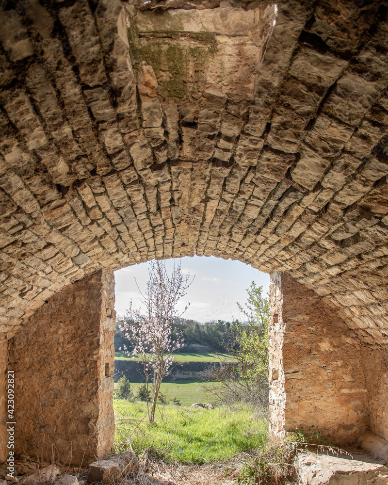 old stone building with arched roof opening to the outside where you ...