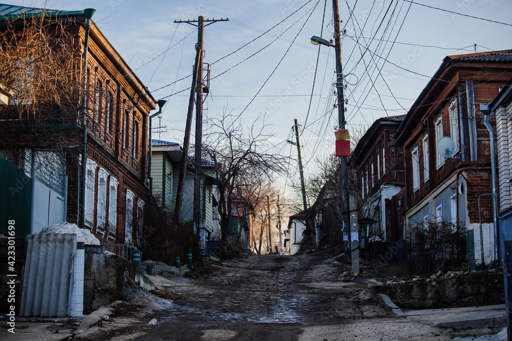 Old houses on low-rise street in old poverty part of Voronezh in Russia ...