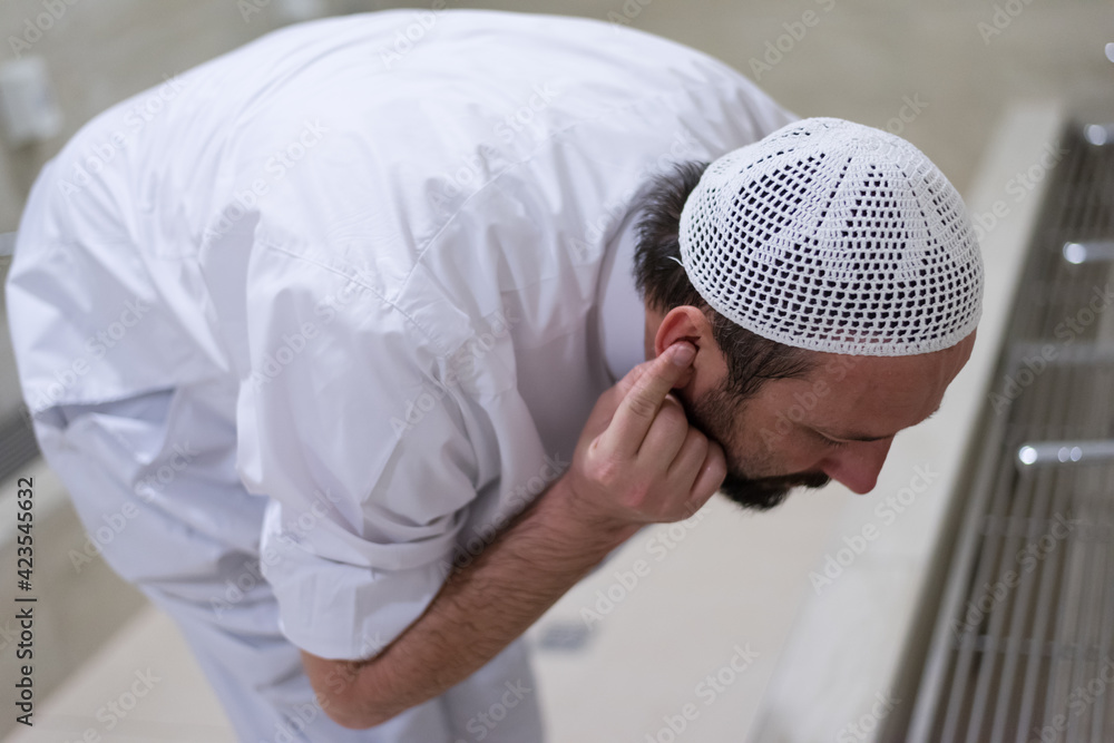 Muslim man taking ablution for prayer. Islamic Religious Rite Ceremony ...