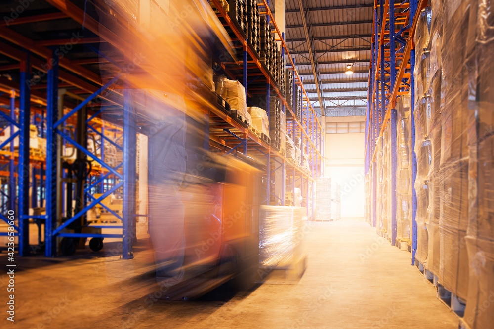 Blur Motion of Workers Driving Forklift Unloading Cargo Pallets in The ...