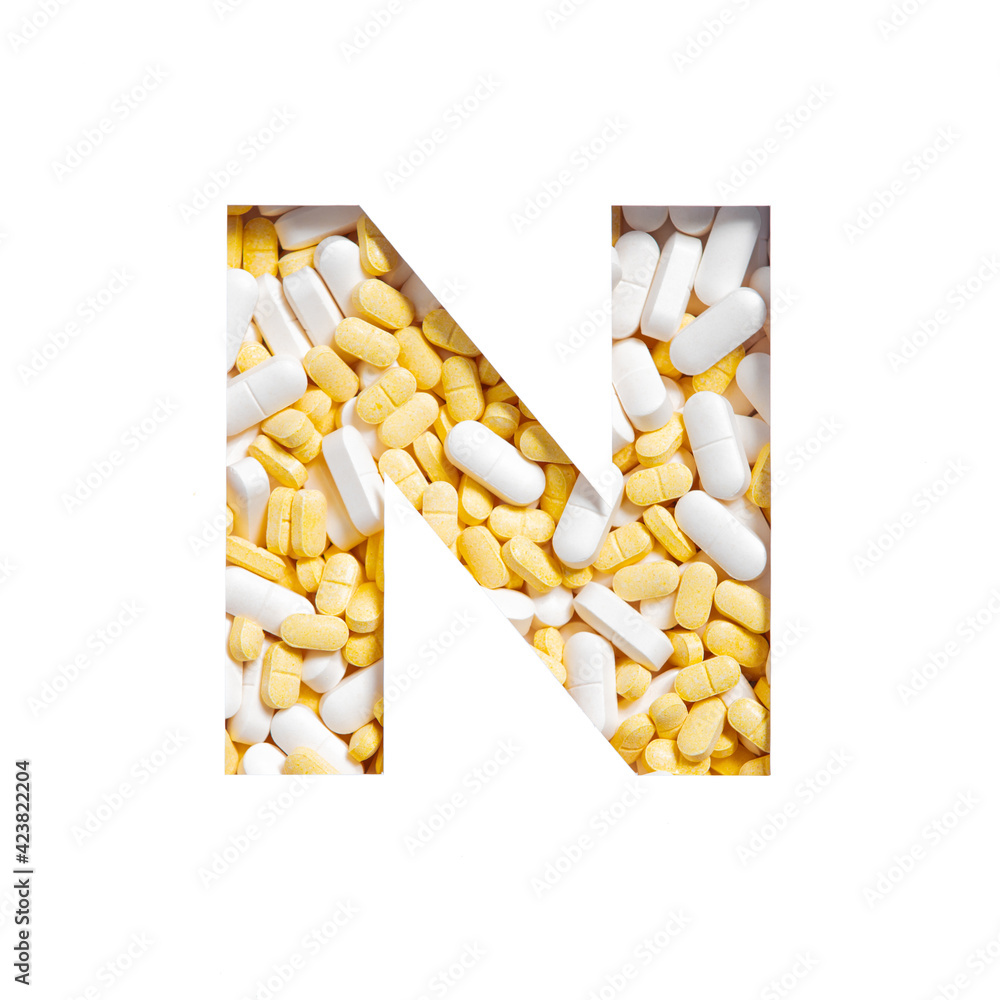 Letter N of English alphabet made of pills of medicines, vitamins and ...