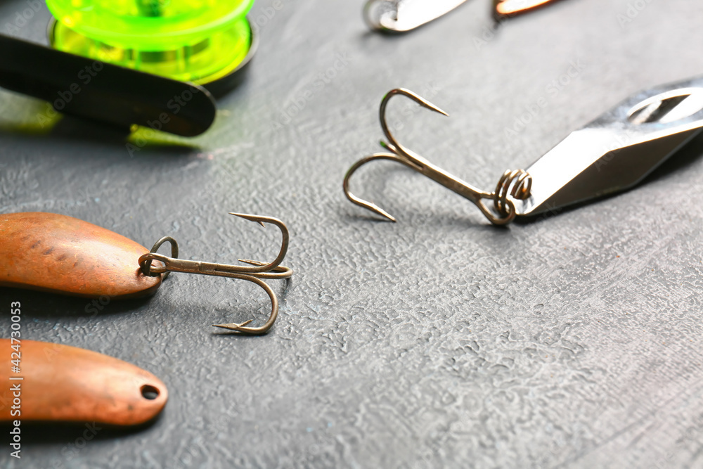 Different fishing spoons on dark background, closeup Stock Photo ...
