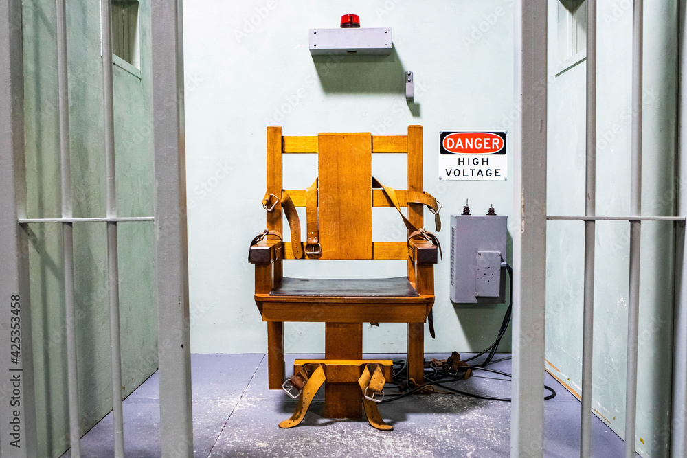 Wooden electric chair for death sentence in prison cell Stock Photo ...