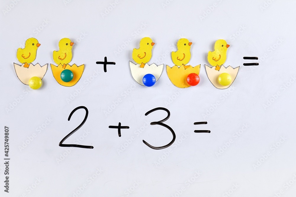 Stock-Foto „Teaching children the basics of addition of mathematics ...
