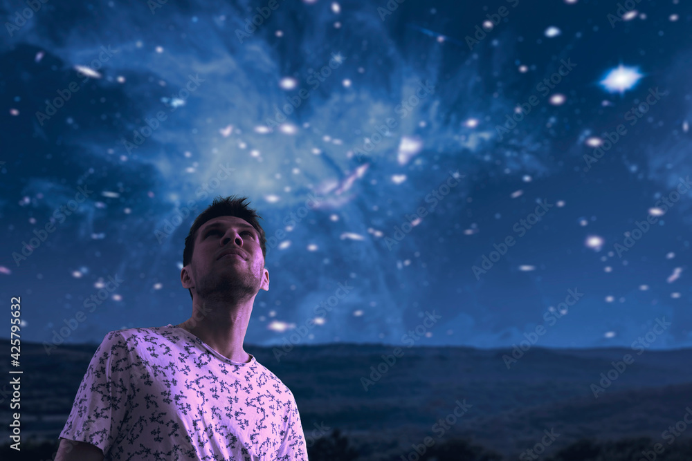 man watching the night sky, looking up, stars of milky way galaxy ...