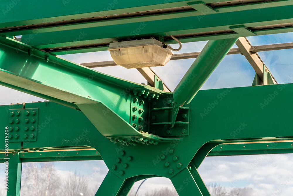 Construction elements of the pedestrian bridge. Steel supports secured ...