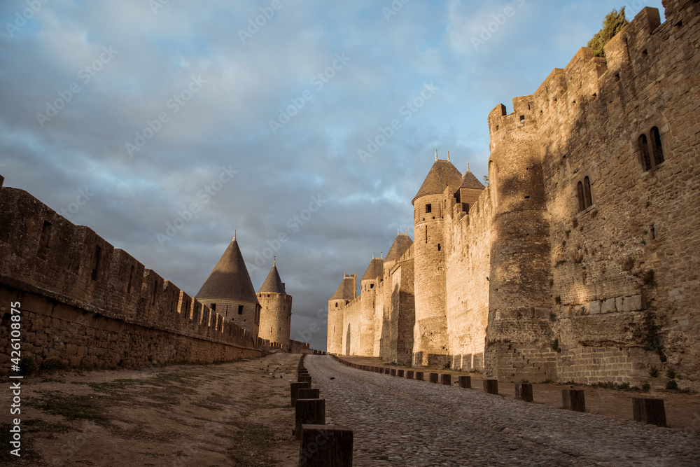 Old fortified french town called Carcassone. Interior of castle at the ...