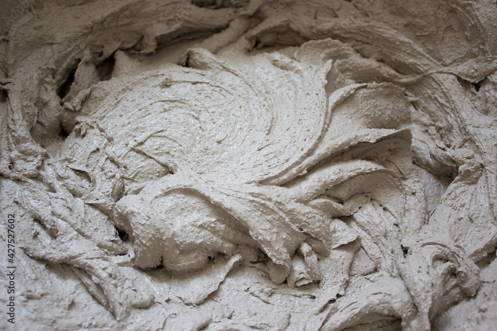 Gypsum plaster symbol. Gypsum plaster in a bucket, prepared for ...