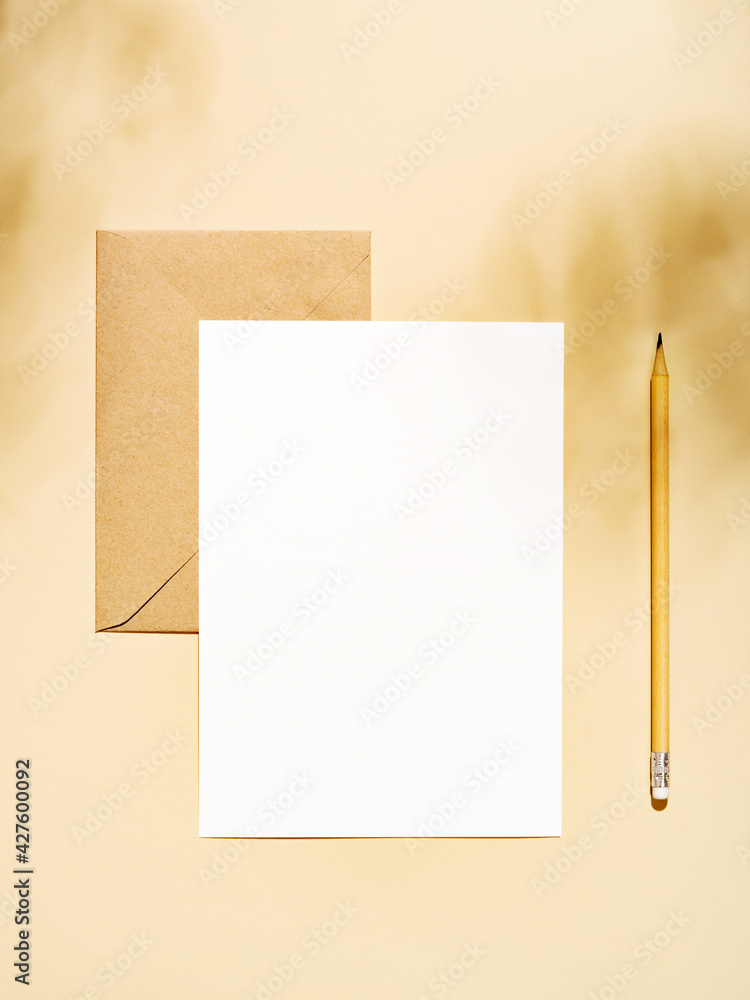White empty card with stationery set of envelope and one pencil. Blank ...