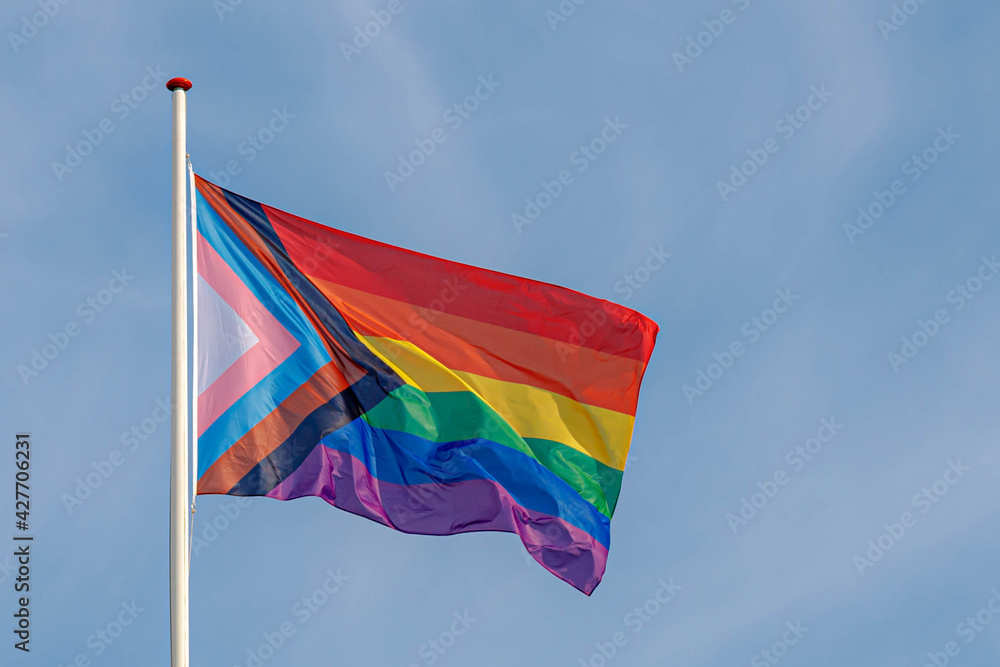 Worldwide LGBTQ community concept with progress pride flag (new design ...