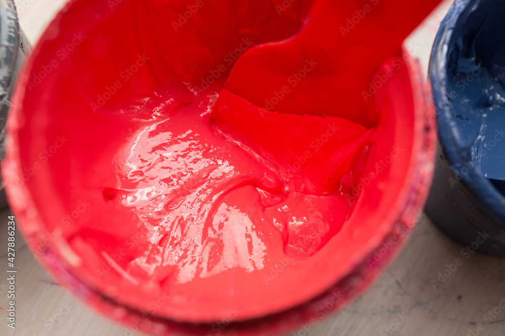 Silk screen printing red paint. Serigraphy. Plastisol paint Stock Photo ...