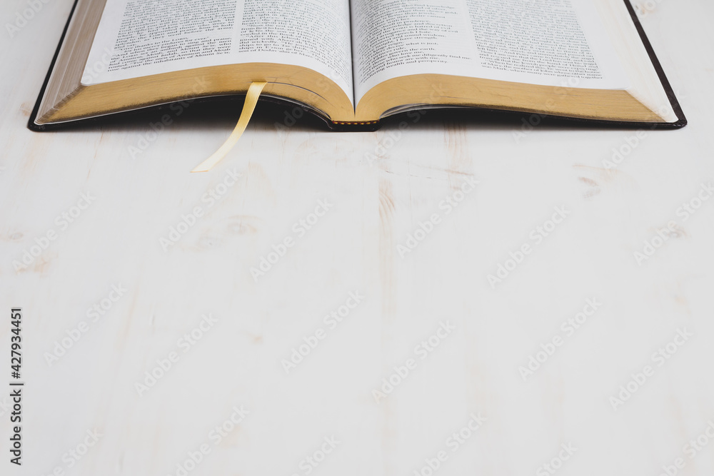 Open bible border on white wood with copy space Stock Photo | Adobe Stock