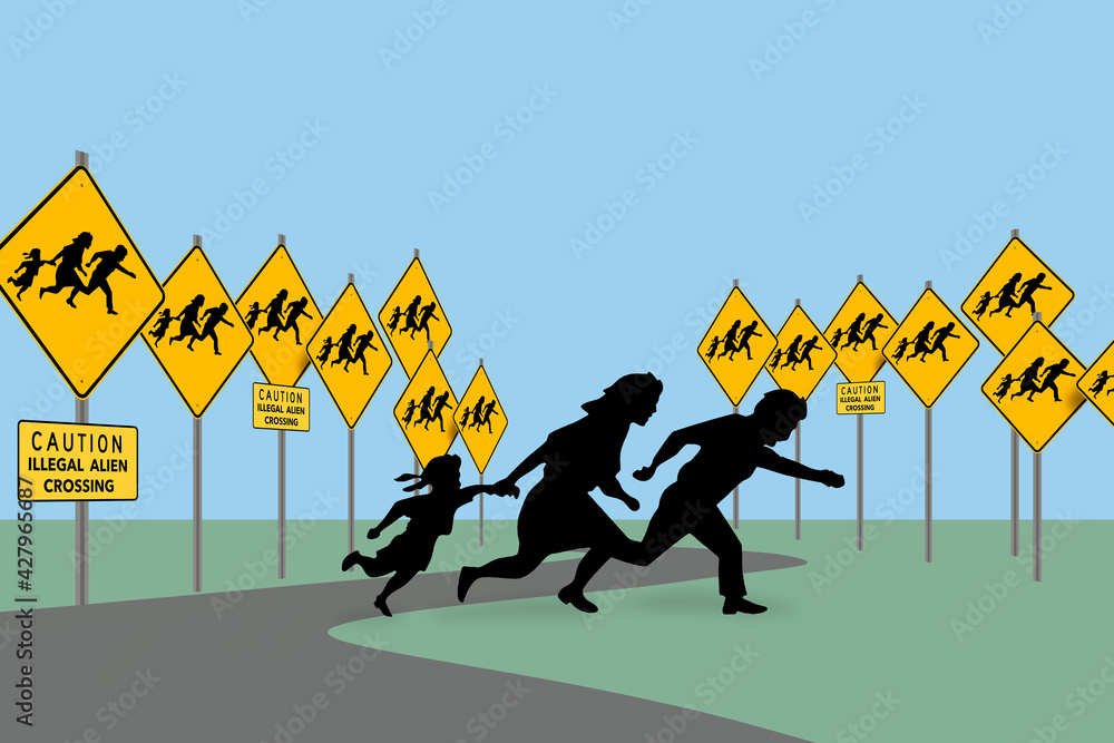 Caution illegal alien crossing traffic signs are seen as a silhouetted ...
